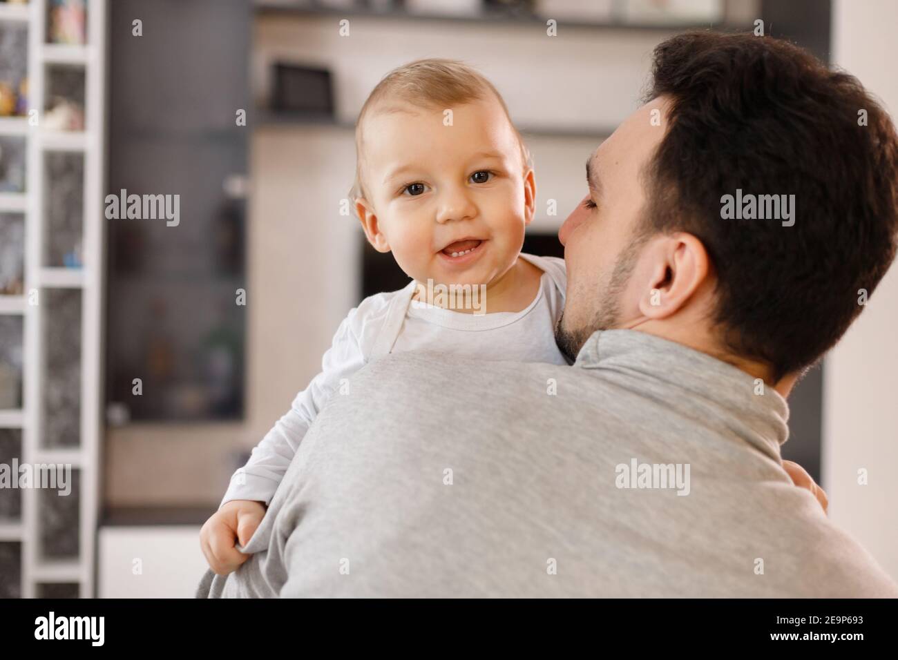 Infant baby boy and father Stock Photo - Alamy
