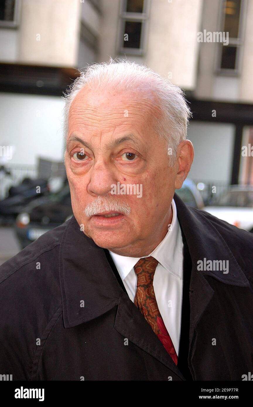 EXCLUSIVE. French actor Michel Serrault poses while leaving RTL radio ...