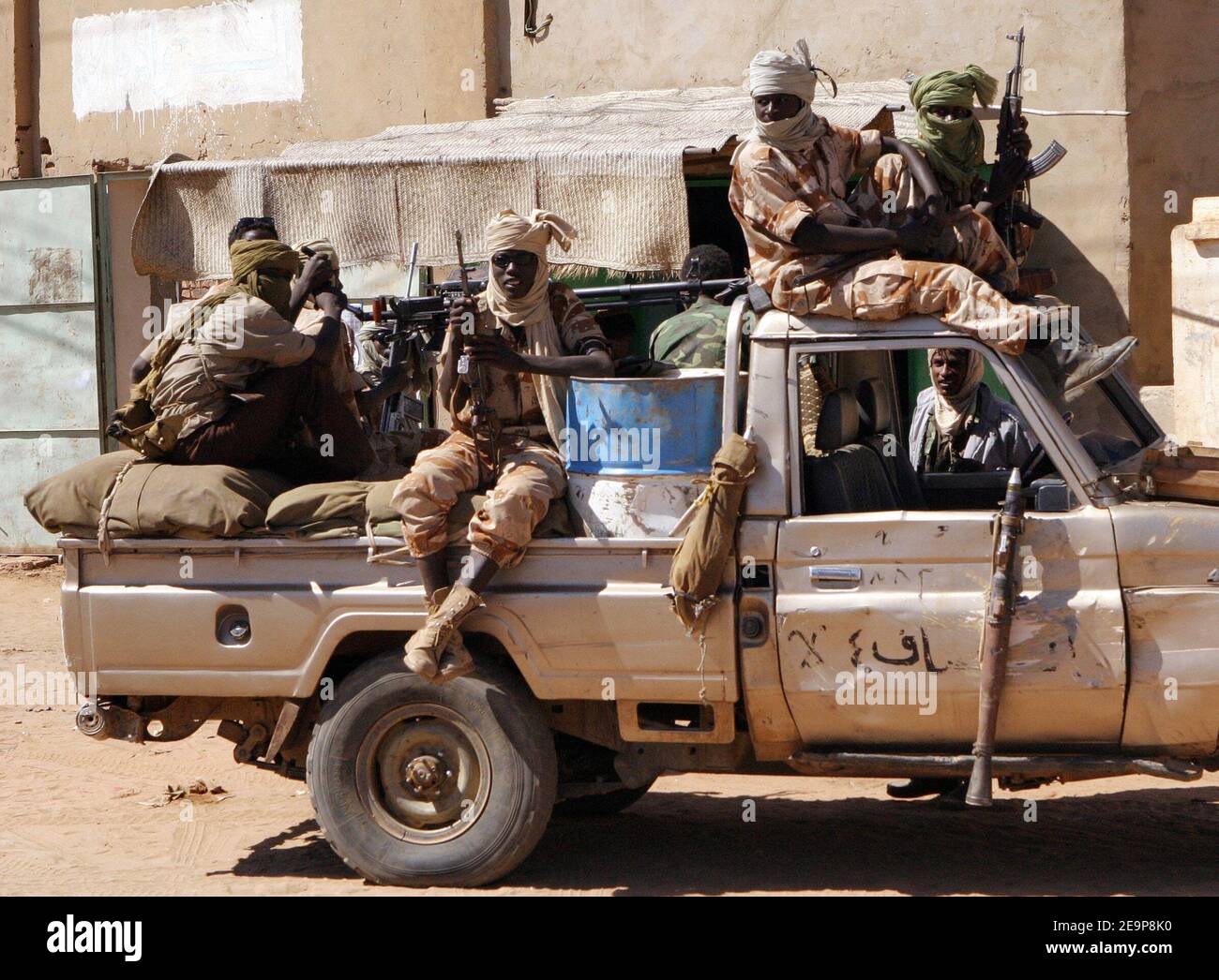 Rebels of Darfur driving the streets of Al Facher in Sudan aboard their ...
