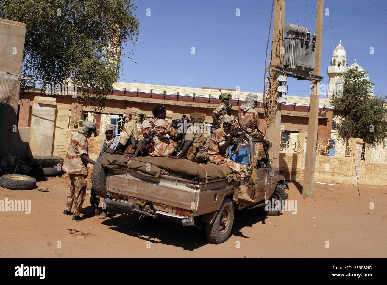 Rebels of Darfur driving the streets of Al Facher in Sudan aboard their ...