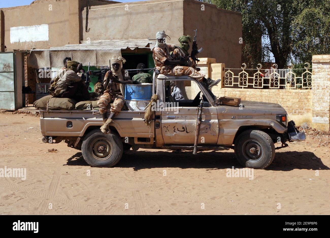 Rebels of Darfur driving the streets of Al Facher in Sudan aboard their ...