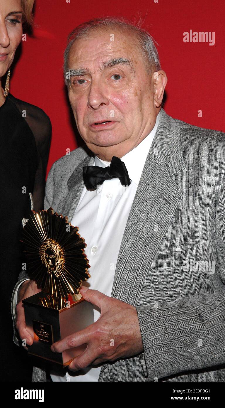 Director Claude Chabrol poses for pictures with his award during the ...