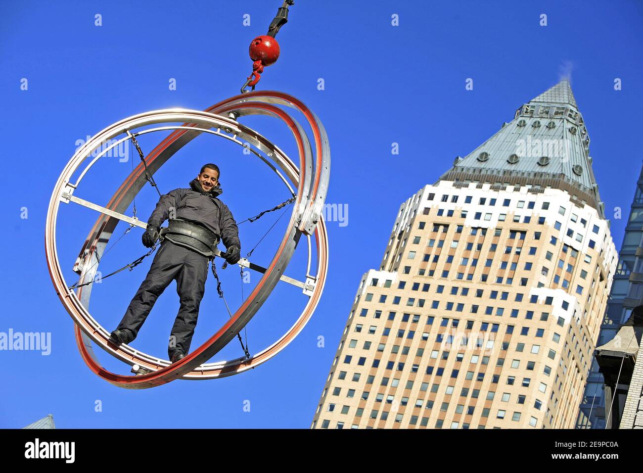 Magician and endurance artist David Blaine hangs from a crane in Times ...