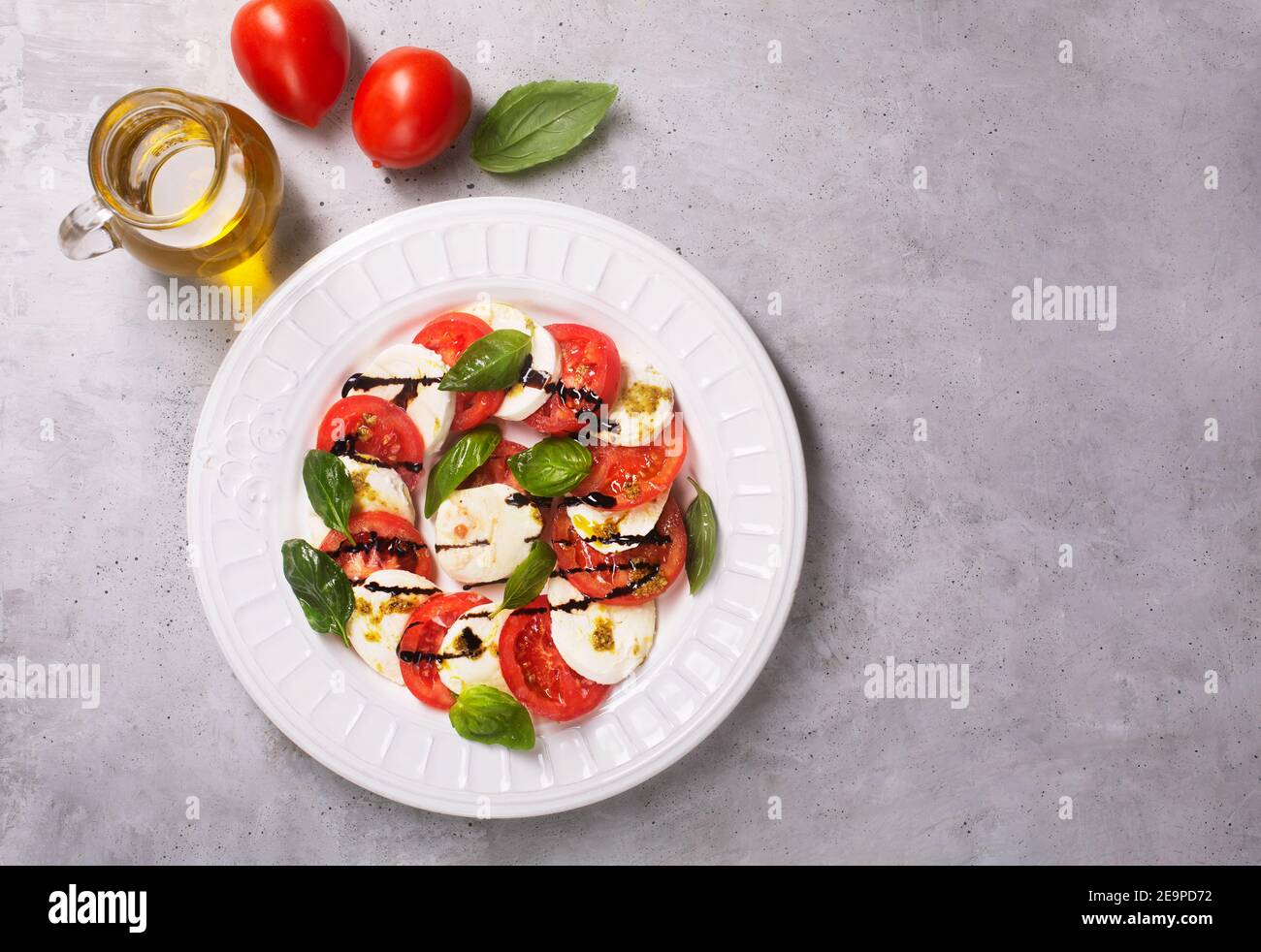 Caprese salad. Italian famous salad with fresh tomatoes, mozzarella ...