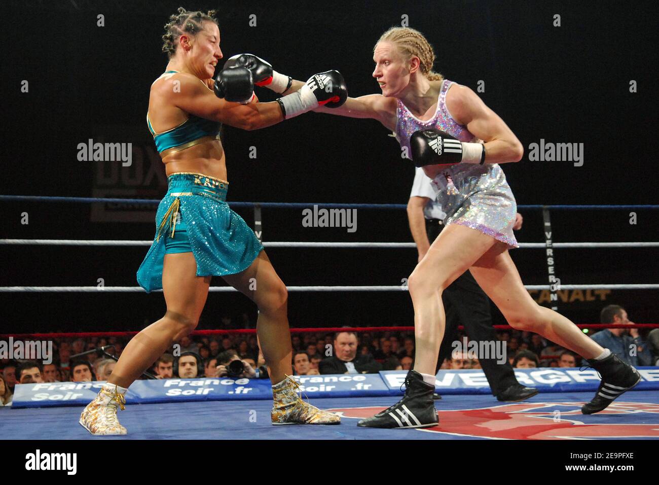 France's Anne Sophie Mathis lands right to the face of France's Myriam ...
