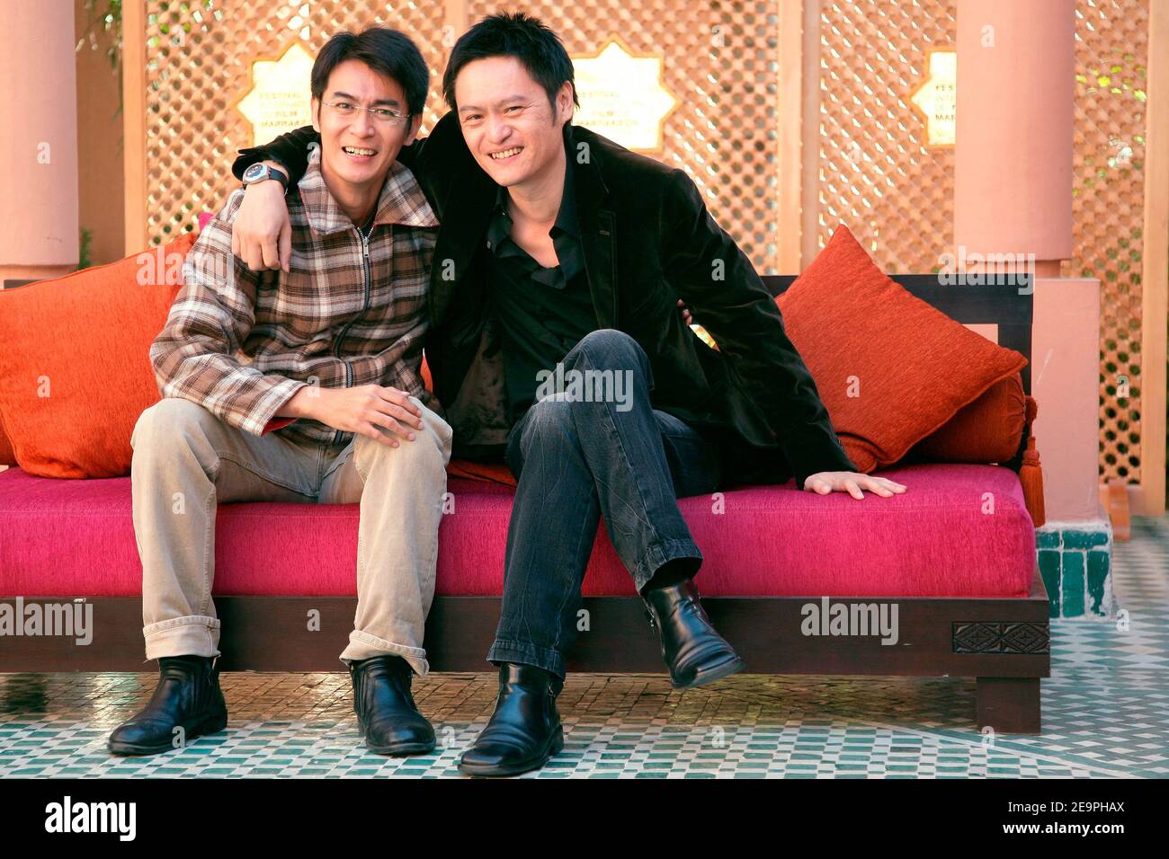 Actors Chye Chee Keong and Pete Teo pose at a photocall for the movie ...