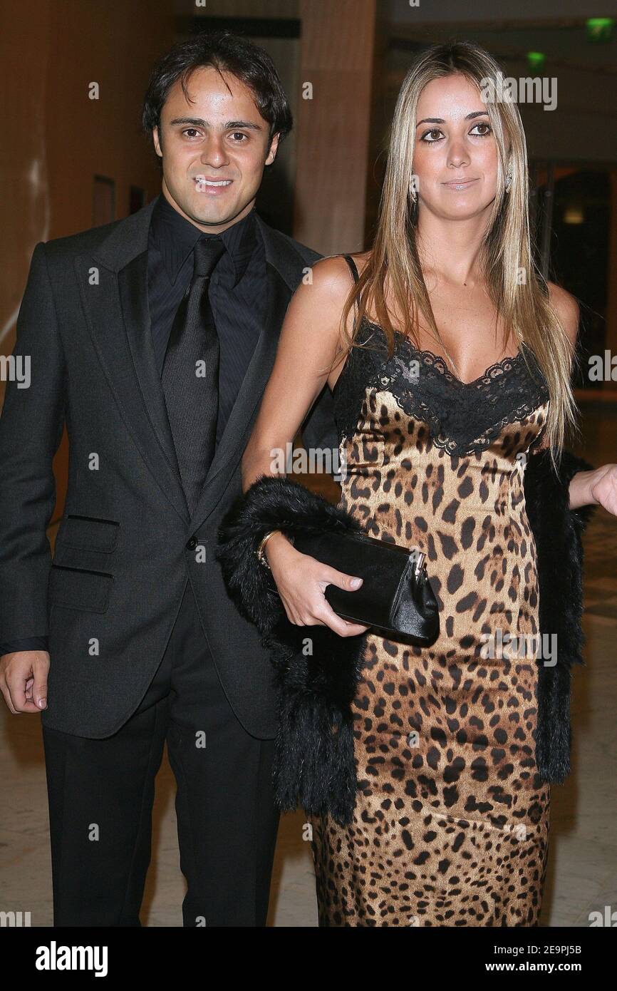 Formula One driver Felipe Massa of Brazil and his girlfriend arrive at ...