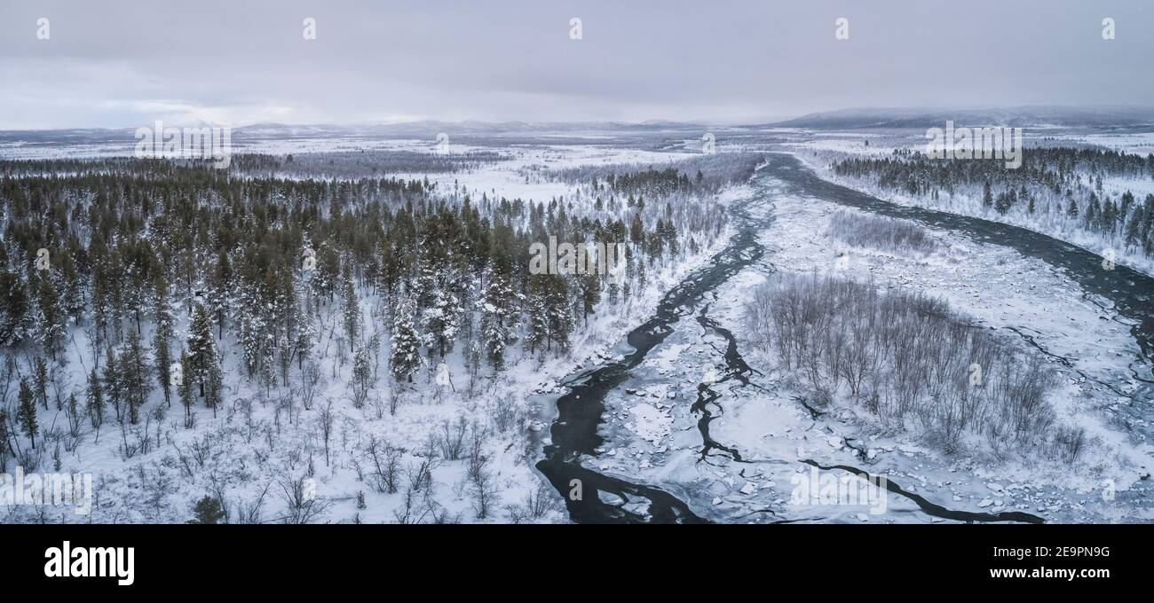 icy forest and river from aerial view in panoramic Stock Photo - Alamy
