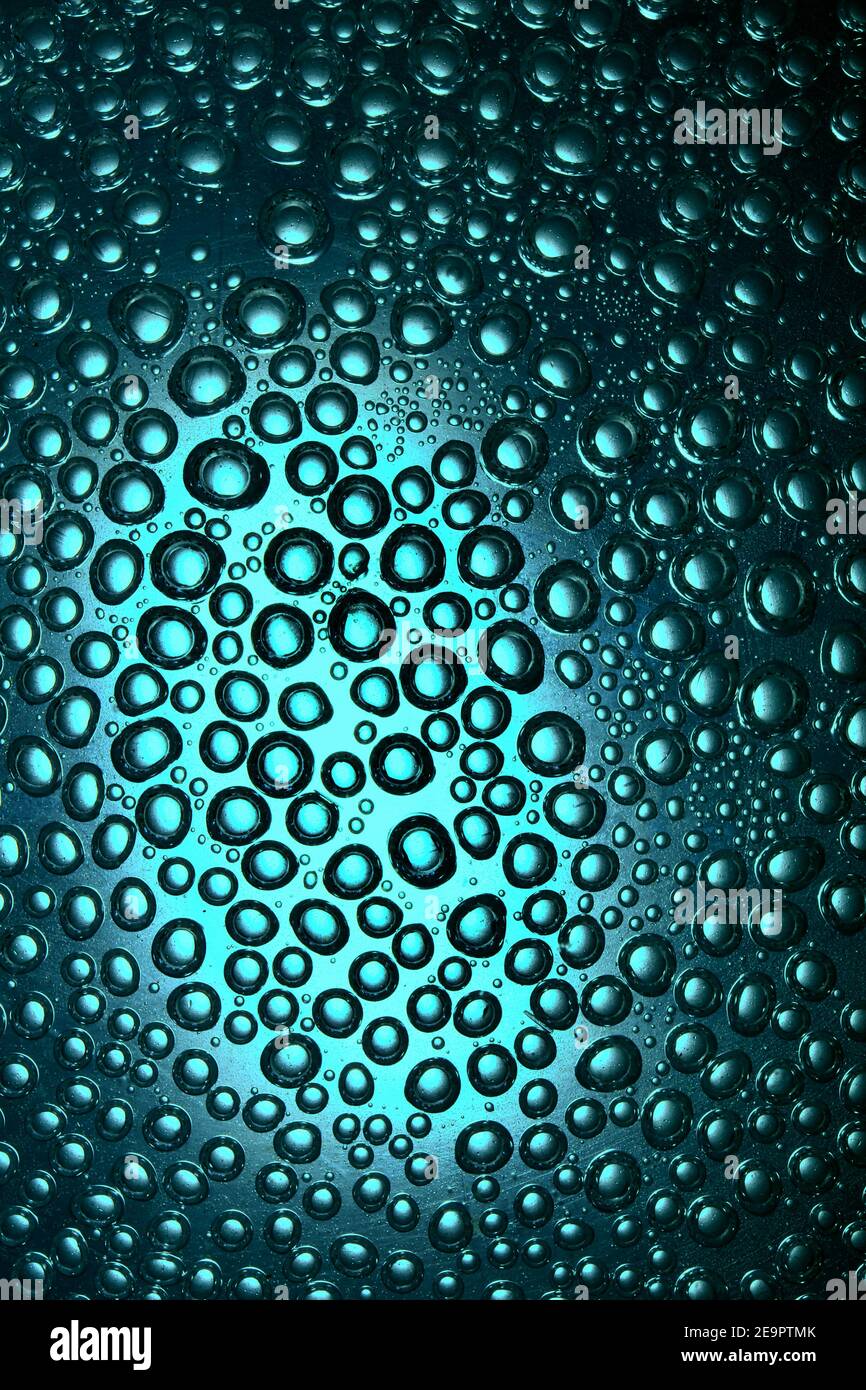 Bubbles on an interesting background, chaotically arranged in water on ...