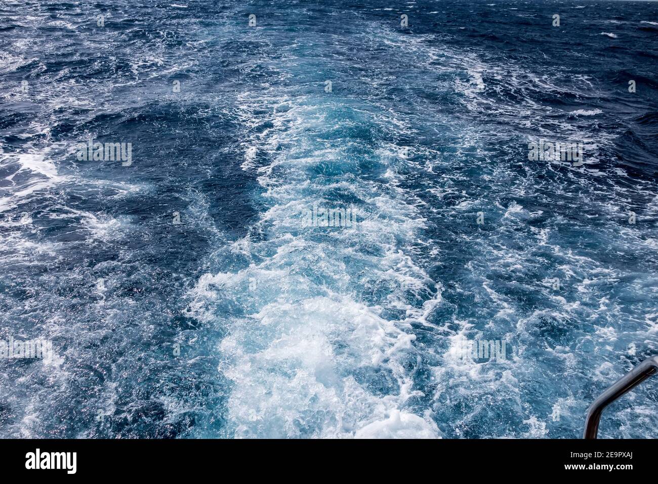 Boat Wave ocean trace on blue sea water wake of cruise liner background ...