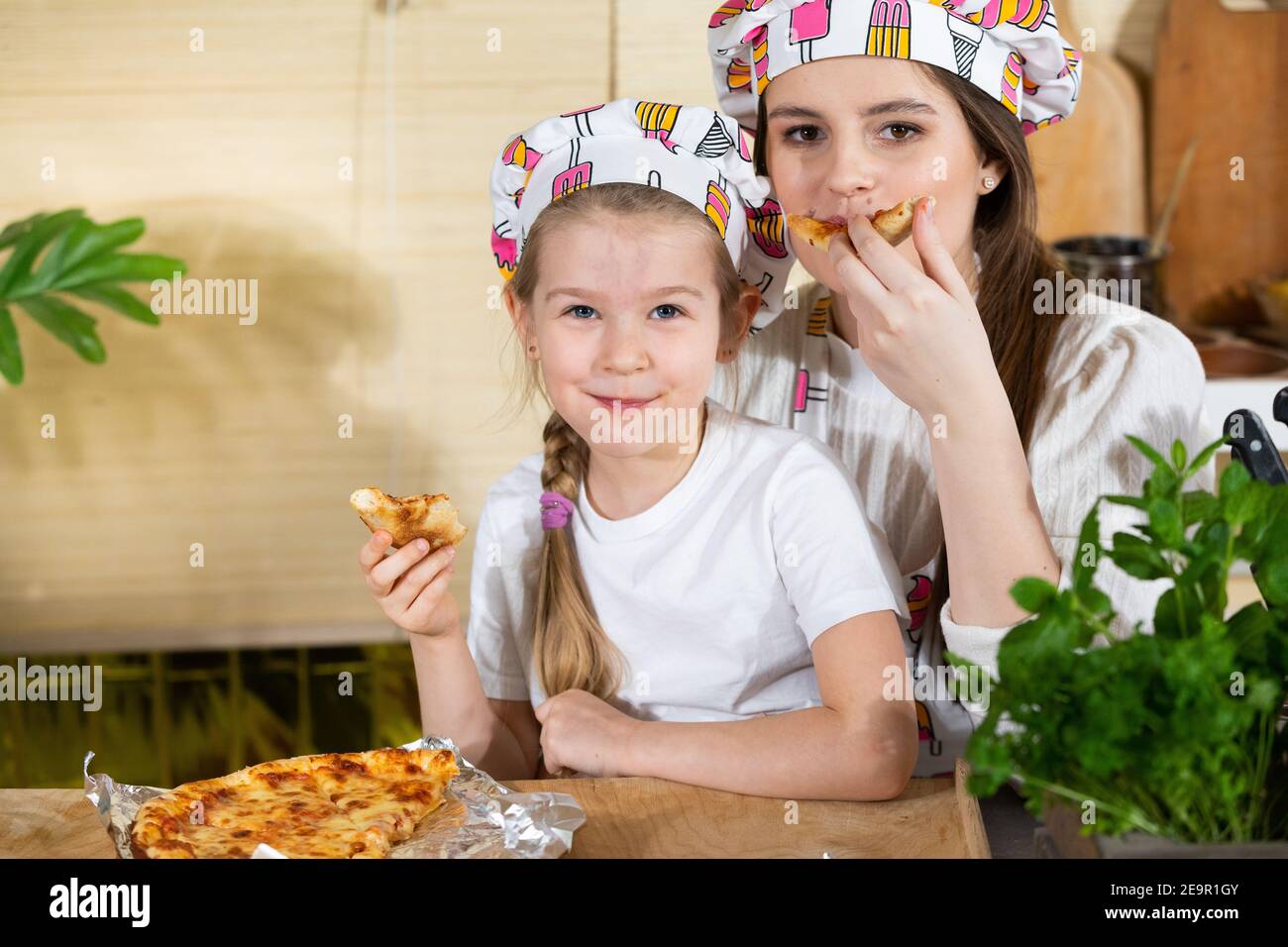 The Daughter To Be Closer To Her Mother Sat Down On Her Lap And