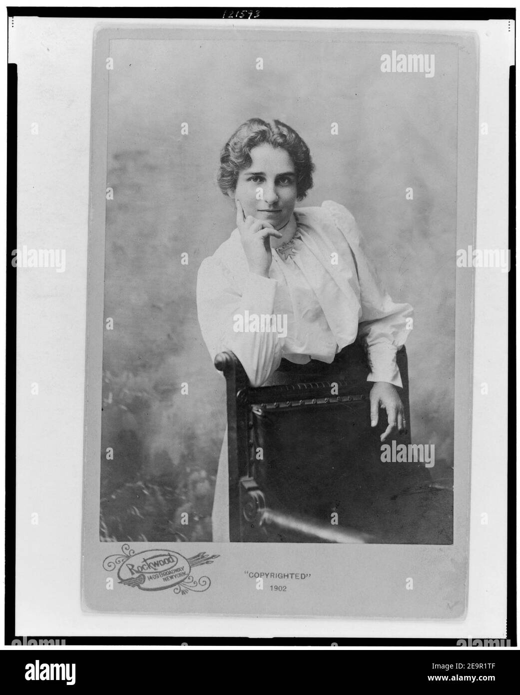 Maud Ballington Booth, half-length portrait, standing behind chair ...