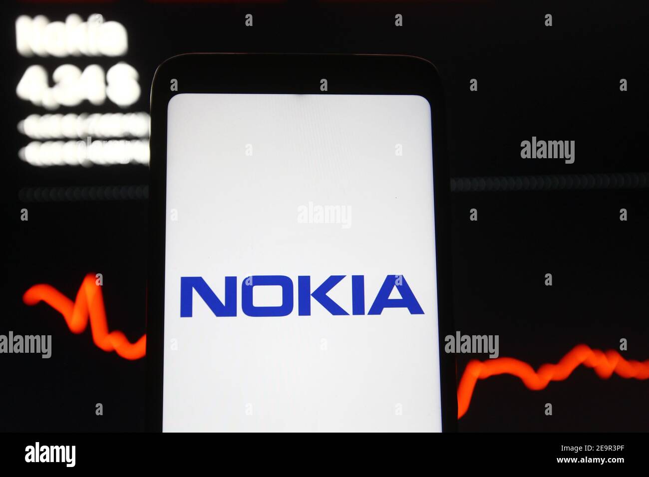 In this photo illustration a Nokia logo is seen on a mobile phone ...