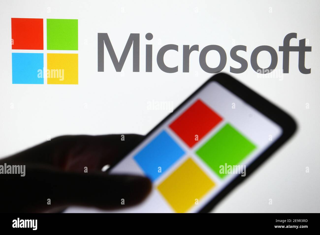 In this photo illustration a Microsoft logo is seen on a mobile phone ...