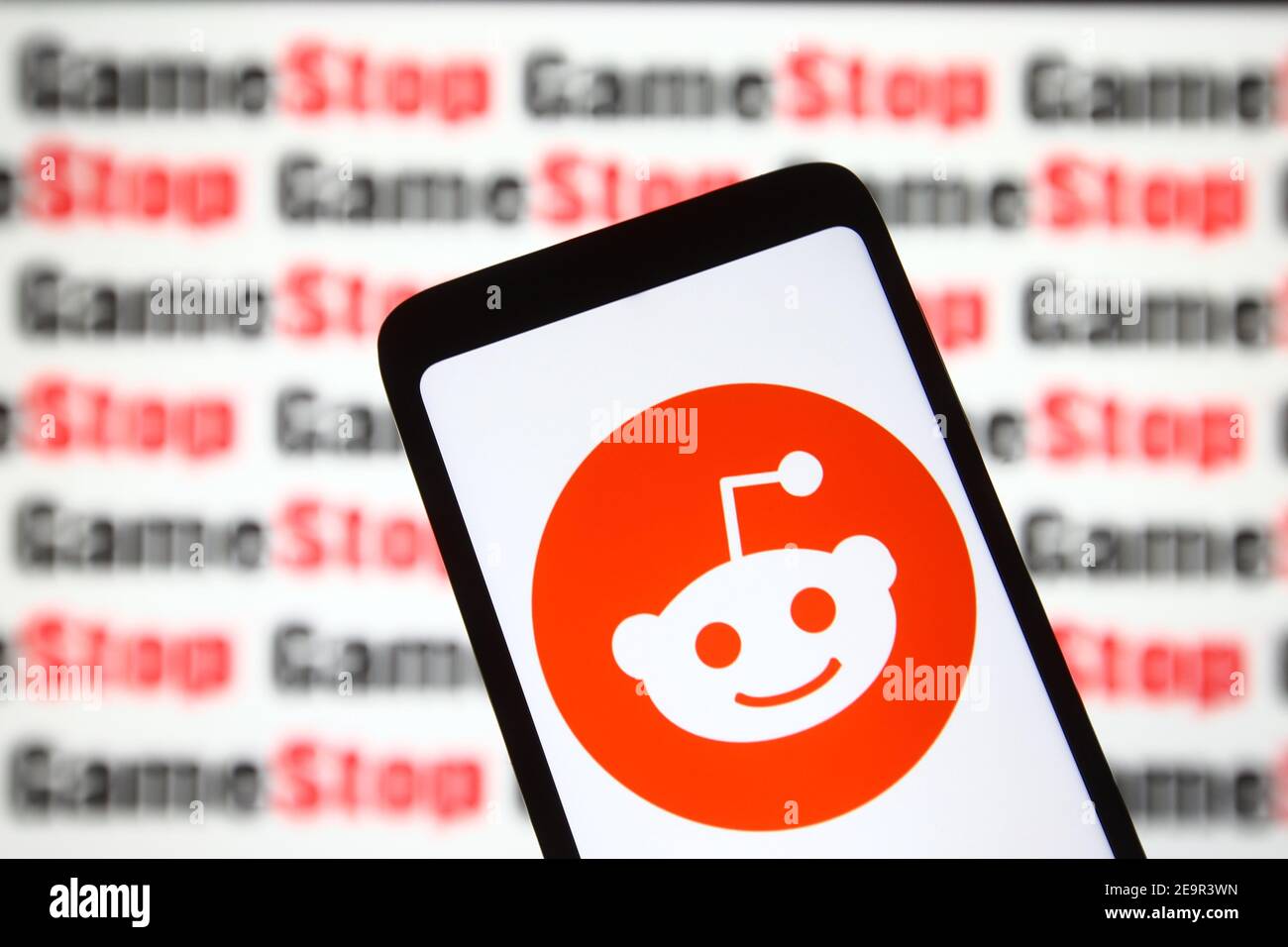 In this photo illustration a Reddit logo is seen on a mobile phone ...