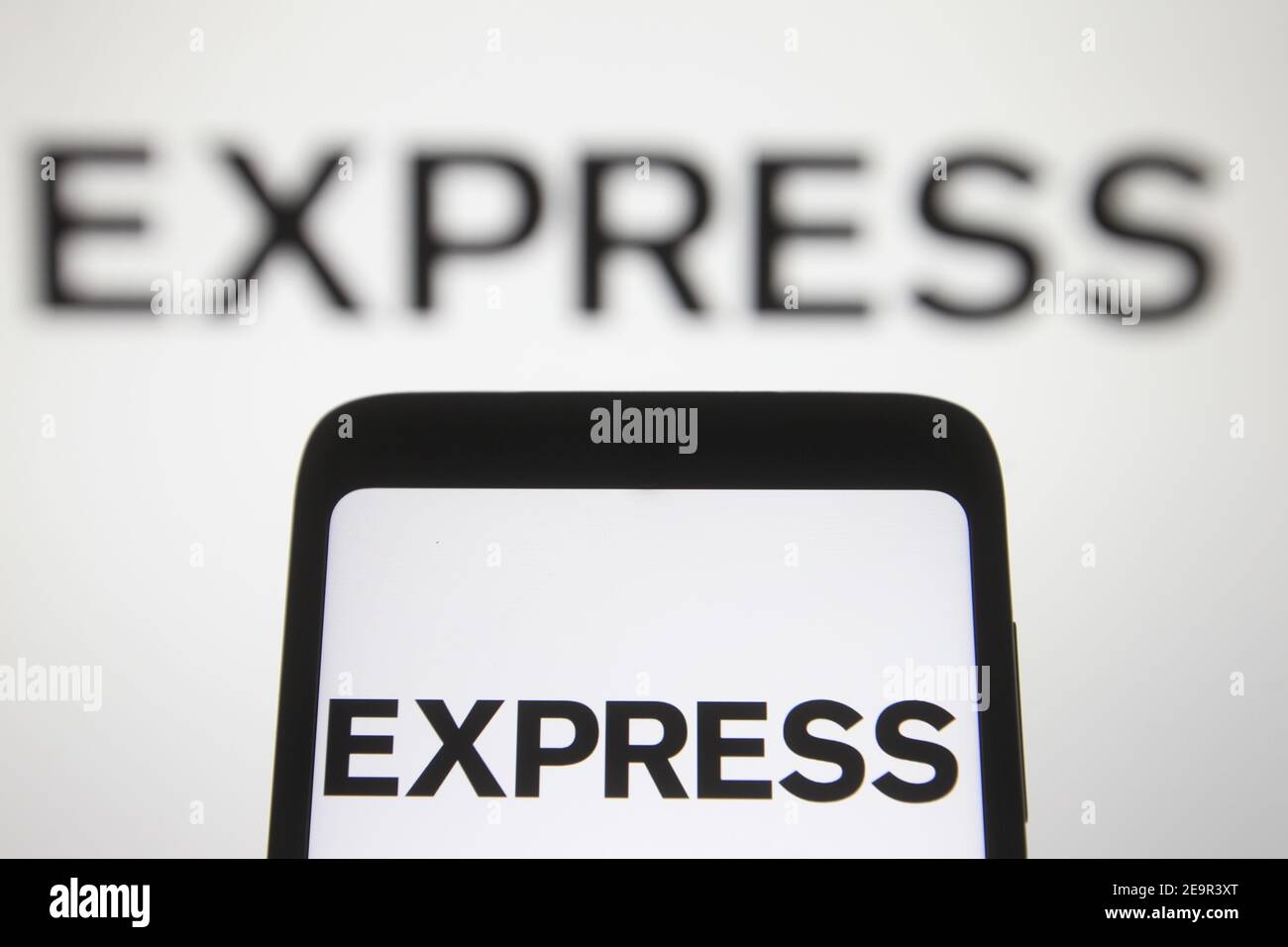 In this photo illustration an Express logo of a U.S. fashion retailer ...