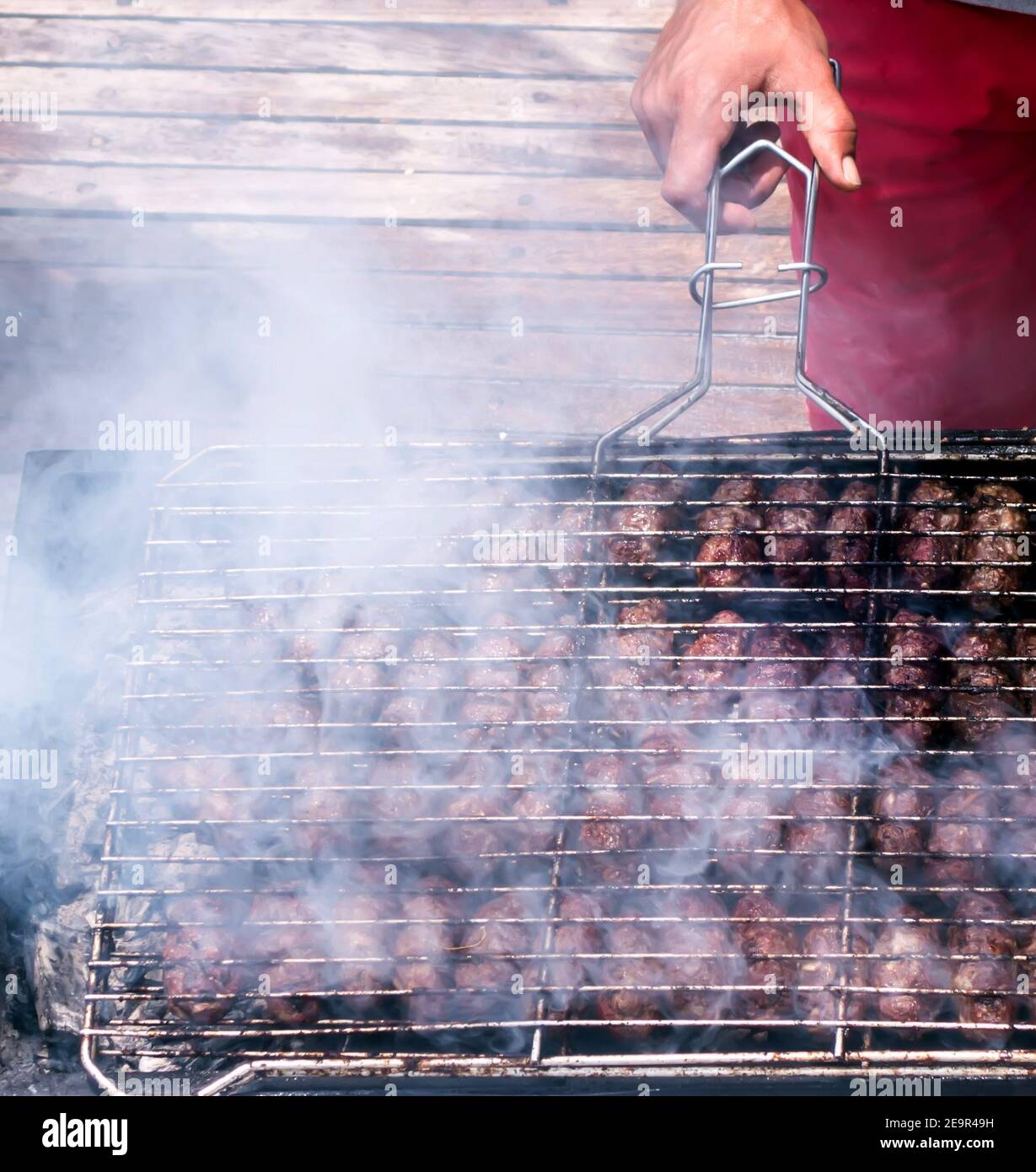 Grill Grilling horizontal food Kebabs in the smoke BBQ. Meat dishes ...