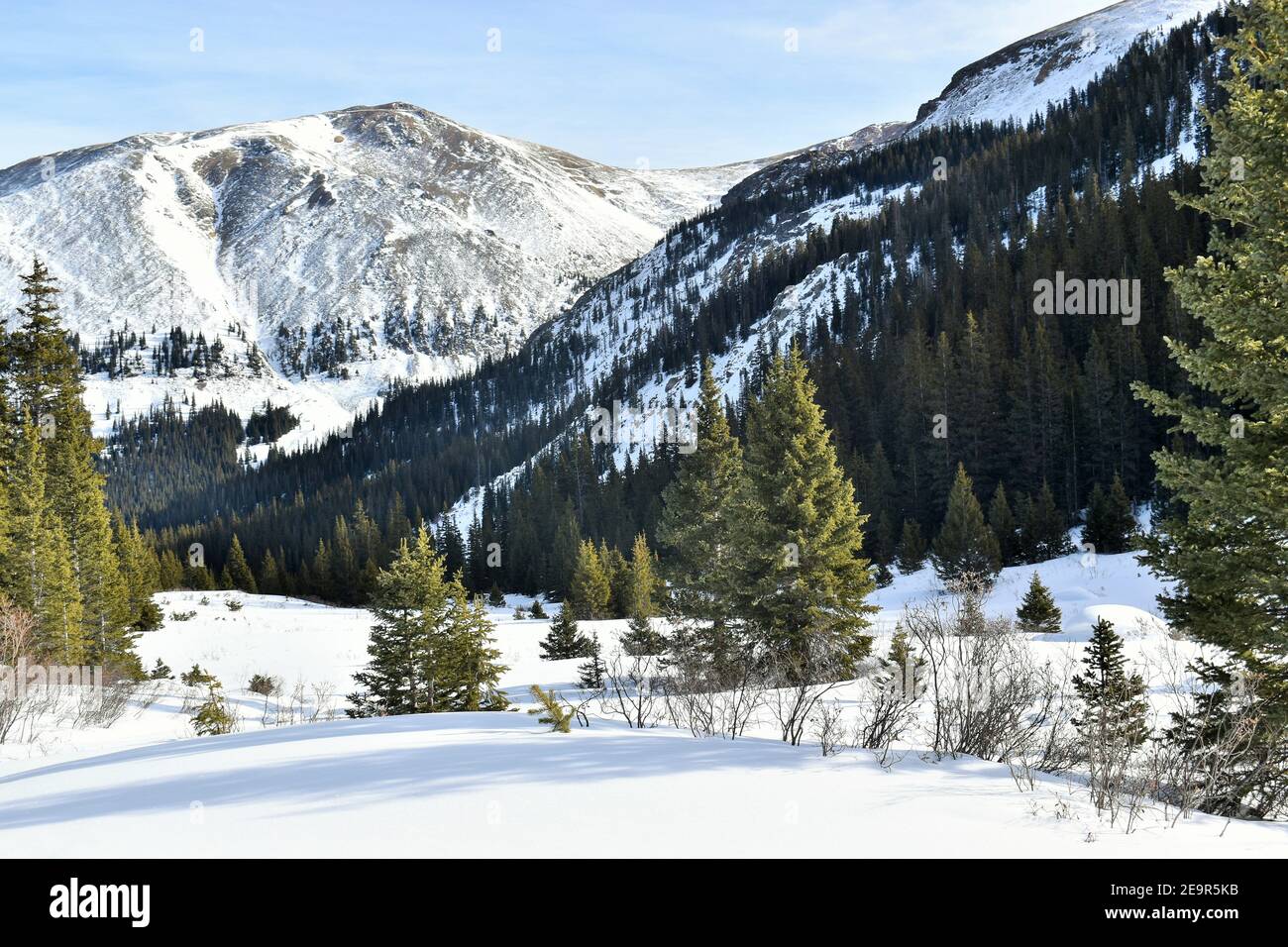 Snow-capped mountain scenery in a winter landscape Stock Photo - Alamy