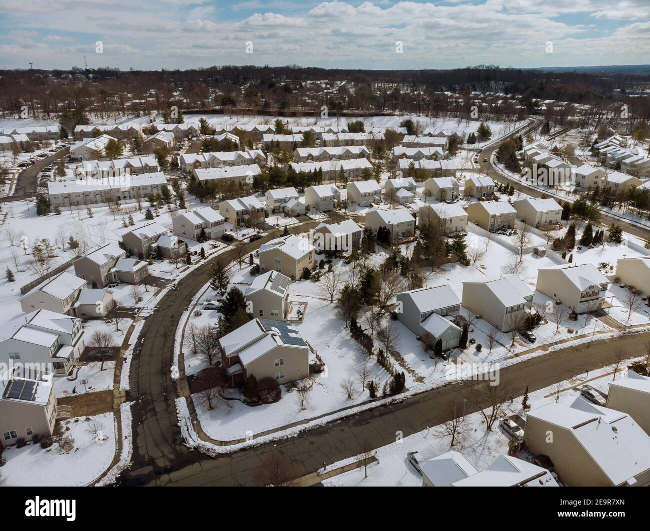 Aerial view of landscape top of the winter town residential houses with ...