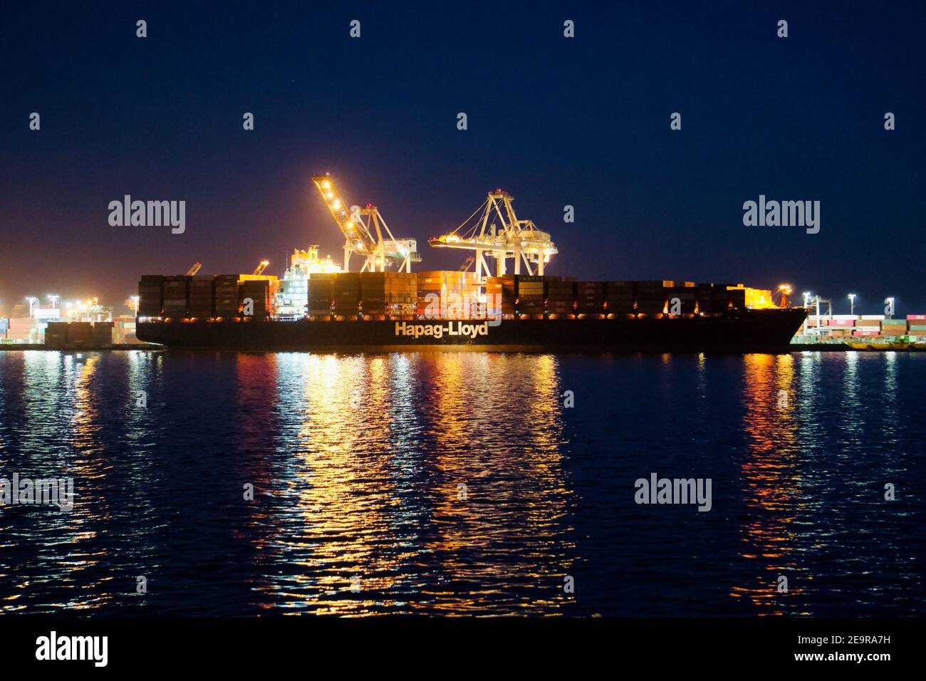 Hapag-Lloyd shipping container barge stacked with intermodal shipping ...