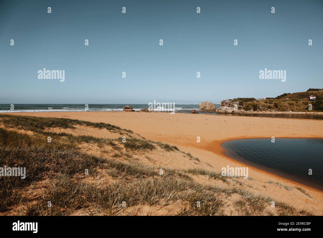 Dunes overlooking the water of Hopkins River Mouth to the Southern ...