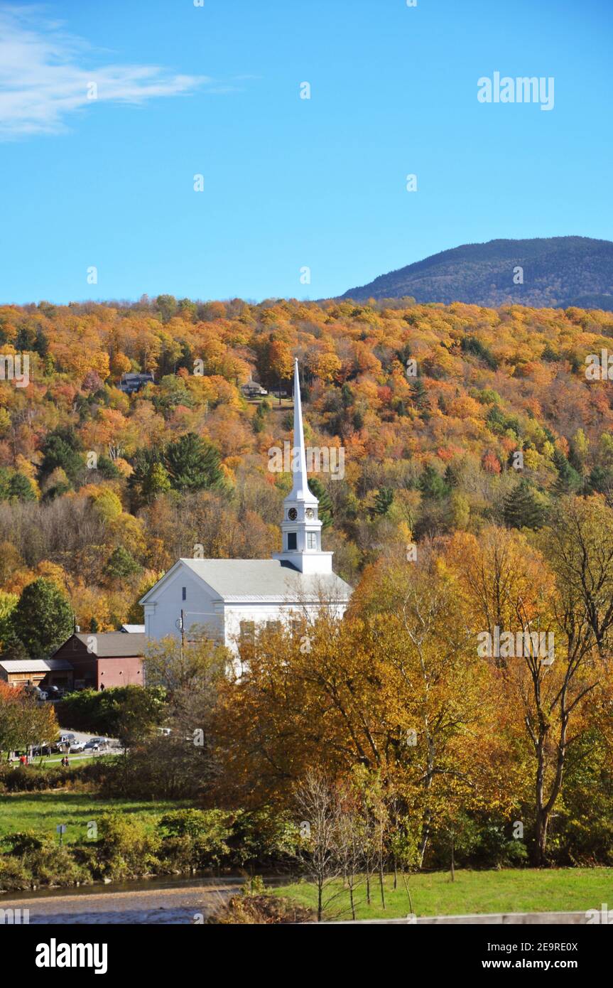 Stowe Community Church with New England Fall Foliage at the background ...