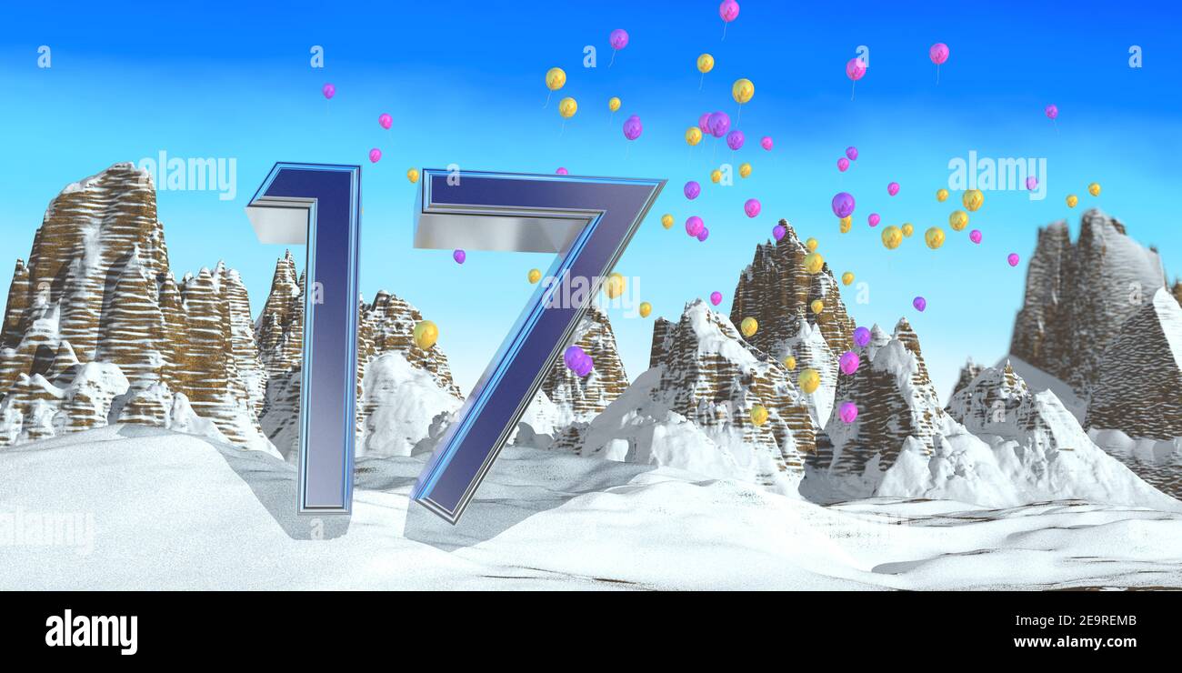 Number 17 in thick blue font on a snowy mountain with rock mountains ...
