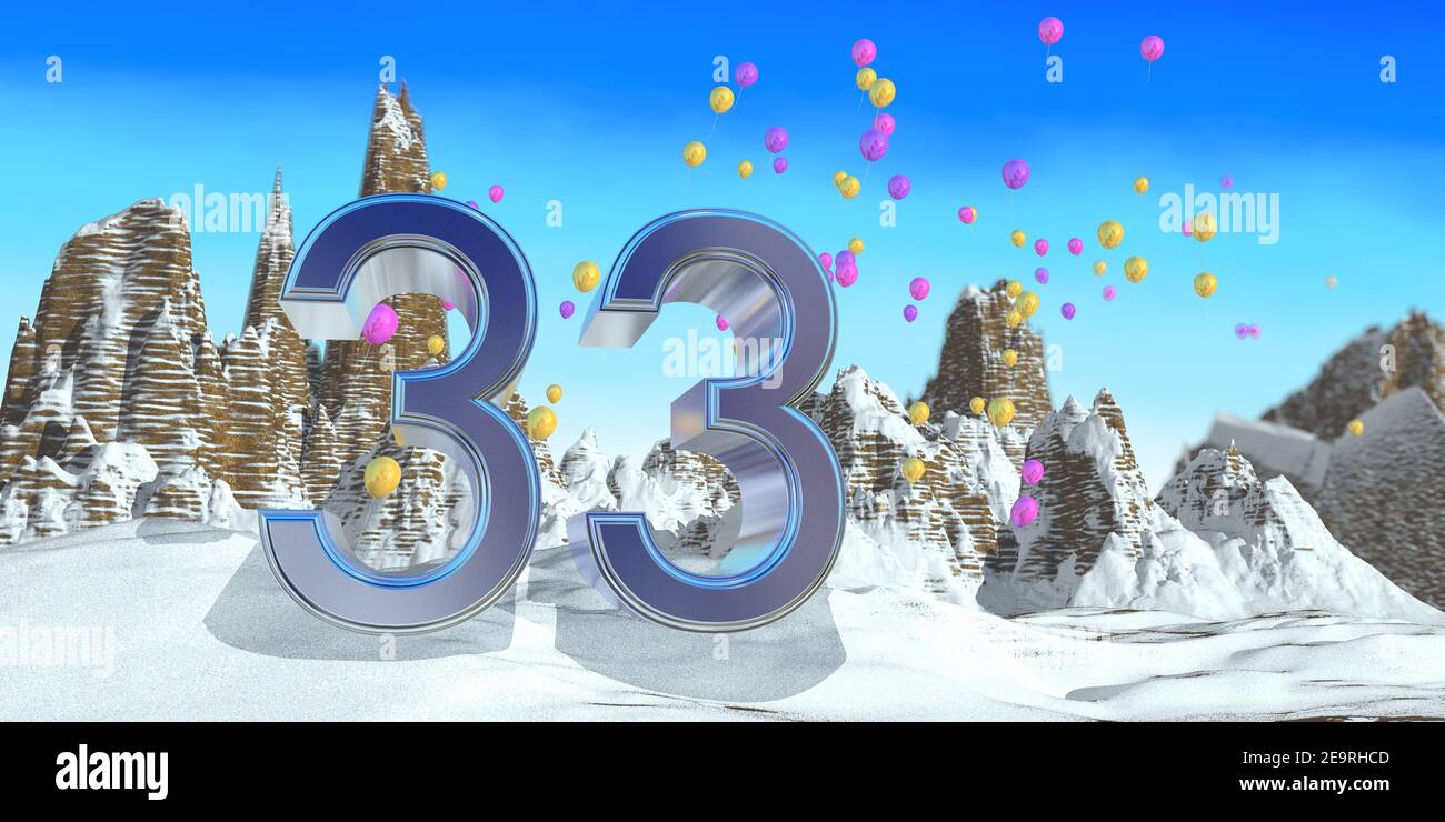 Number 33 in thick blue font on a snowy mountain with rock mountains ...