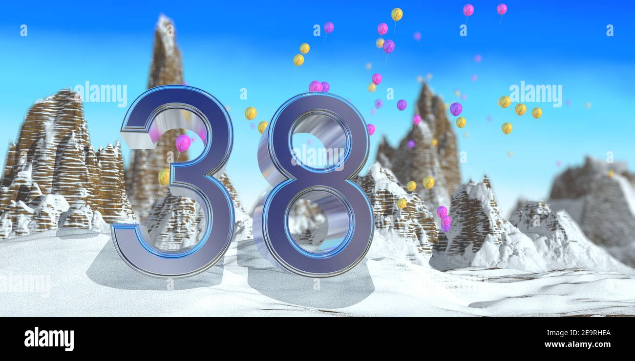 Number 38 in thick blue font on a snowy mountain with rock mountains ...