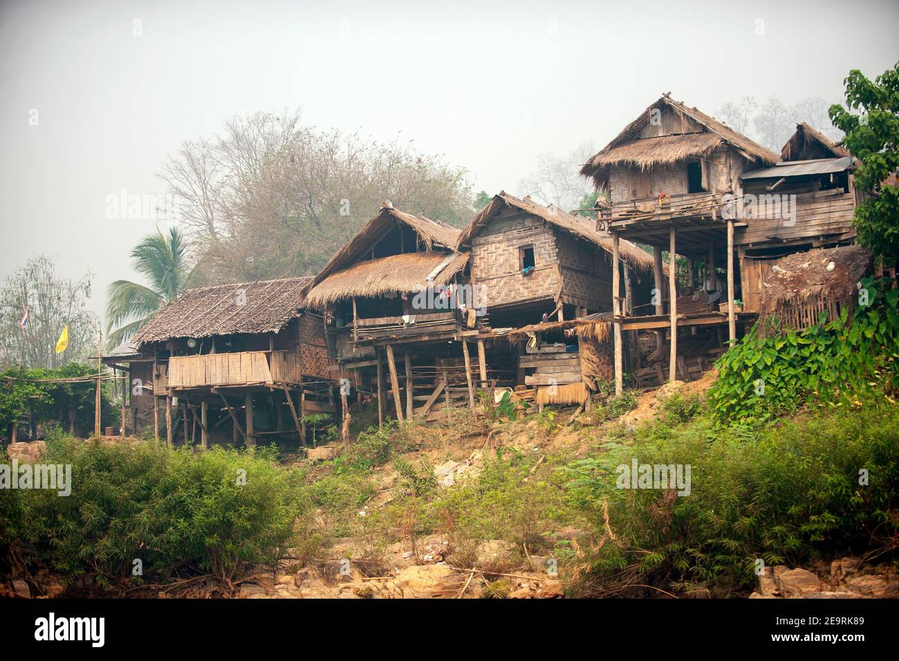 Villages in rural northern Thailand, houses made of wood and bamboo on ...