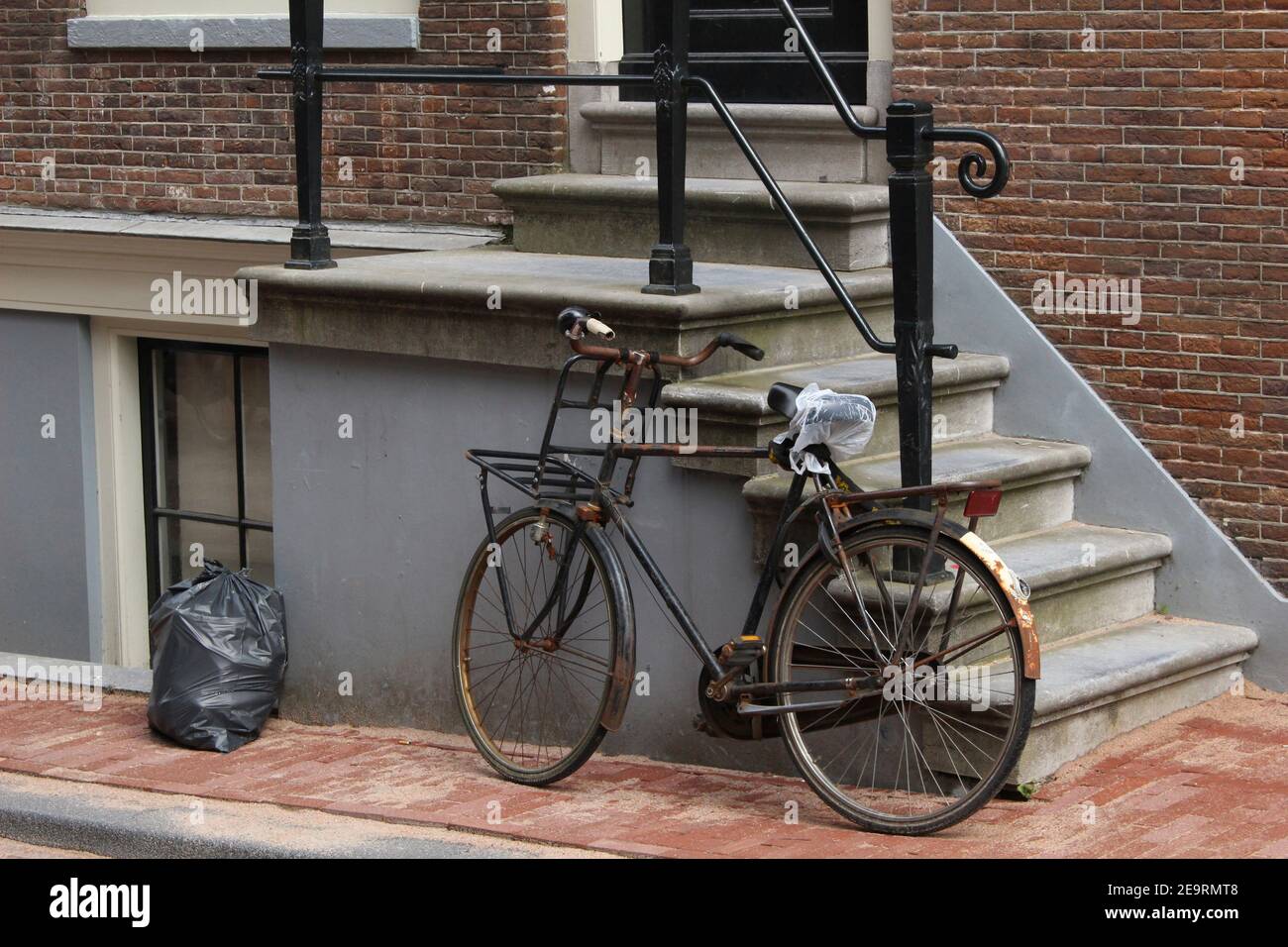 Bike on the steps Stock Photo - Alamy
