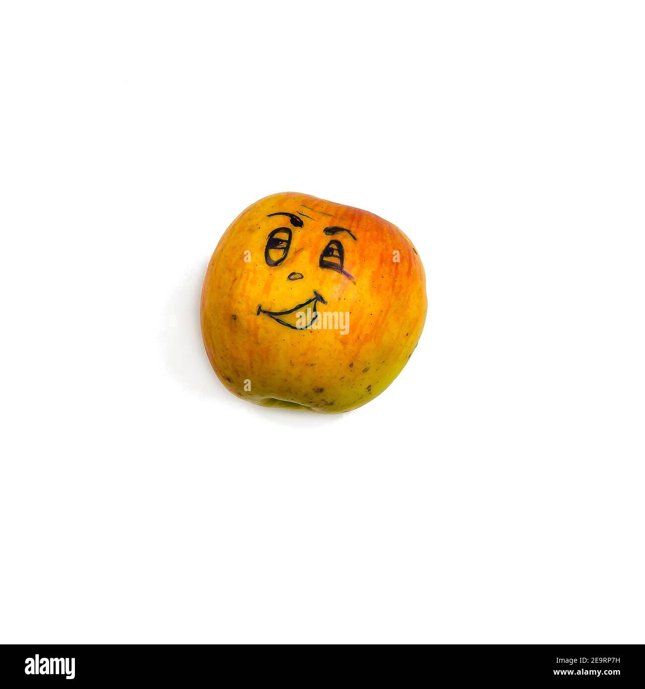 Jolly apple with a face. Red apple with a joyful grimace painted on it ...