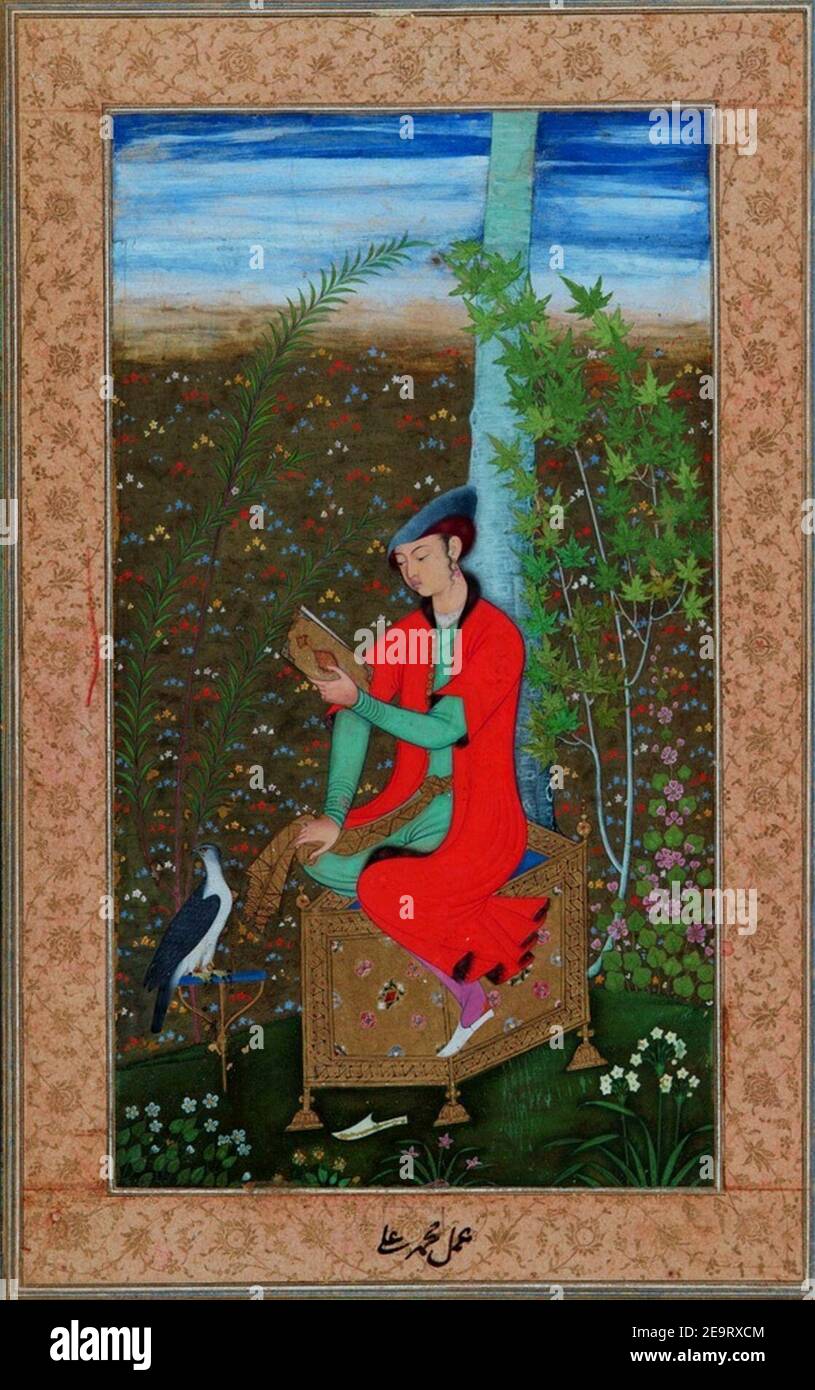 Muhammad Ali reading book Stock Photo - Alamy