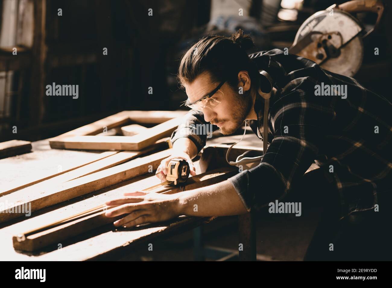 Carpenter man attend to making masterpiece woodworks handcrafted ...