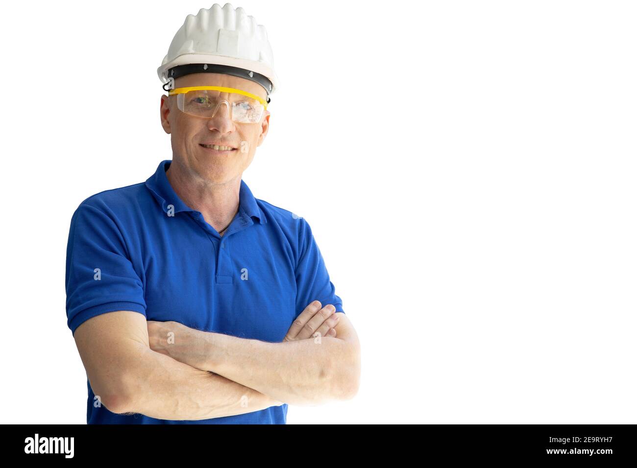 Engineer worker foreman standing arm crossed isolated looking camera ...