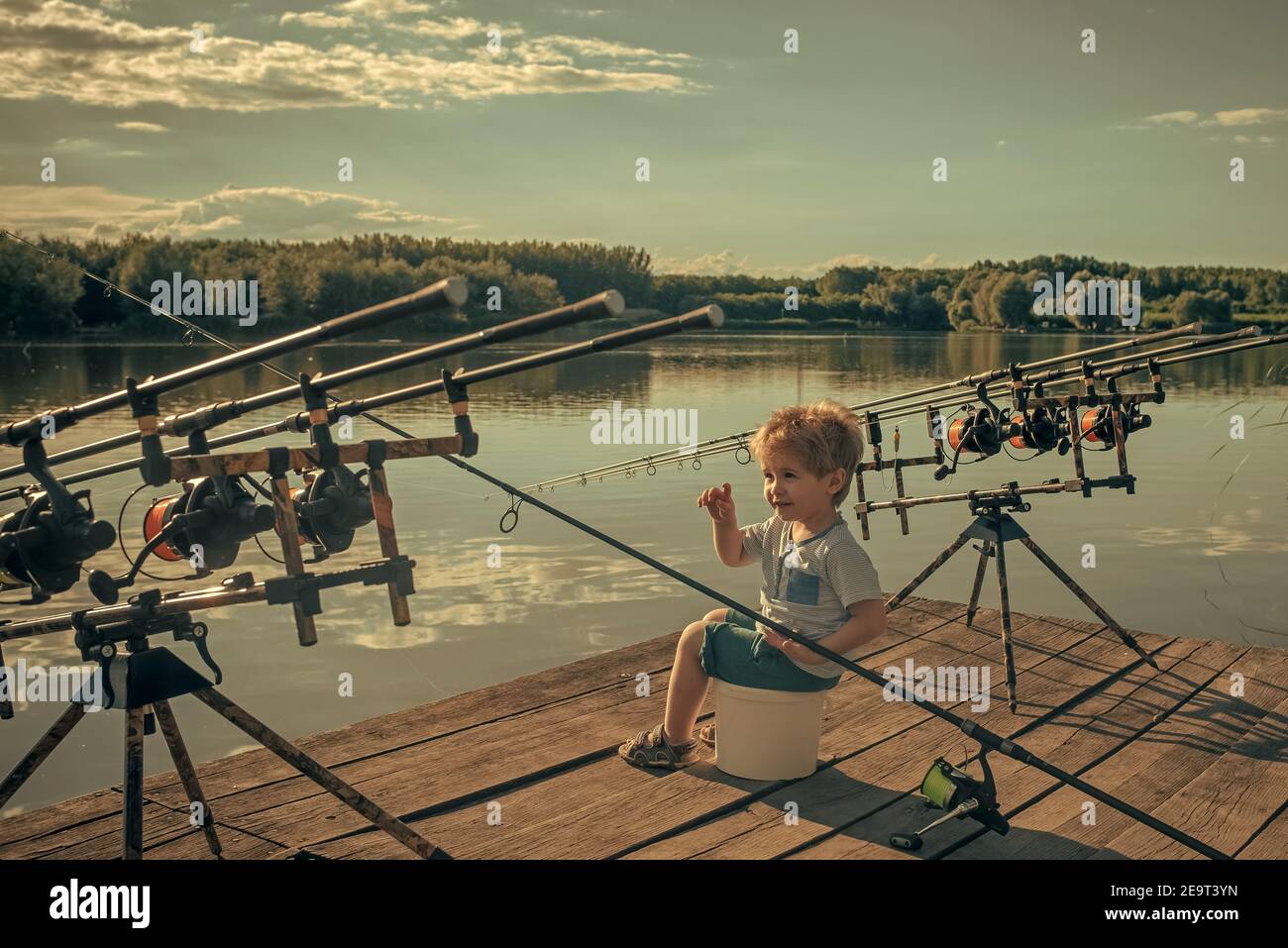 Boy child kid with rod and reel hi-res stock photography and images - Alamy