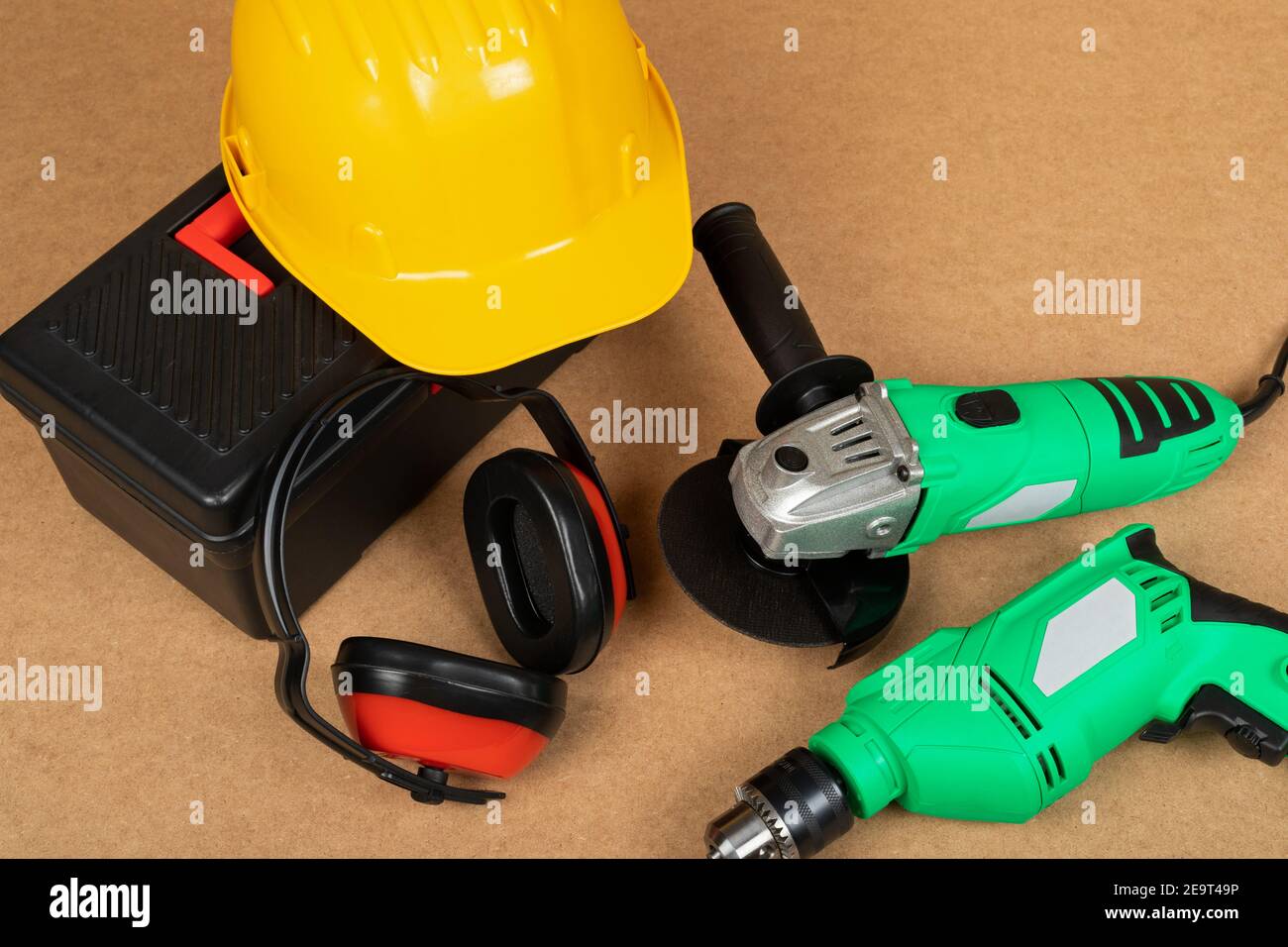 Picture of construction equipment and tools on wooden background, top ...