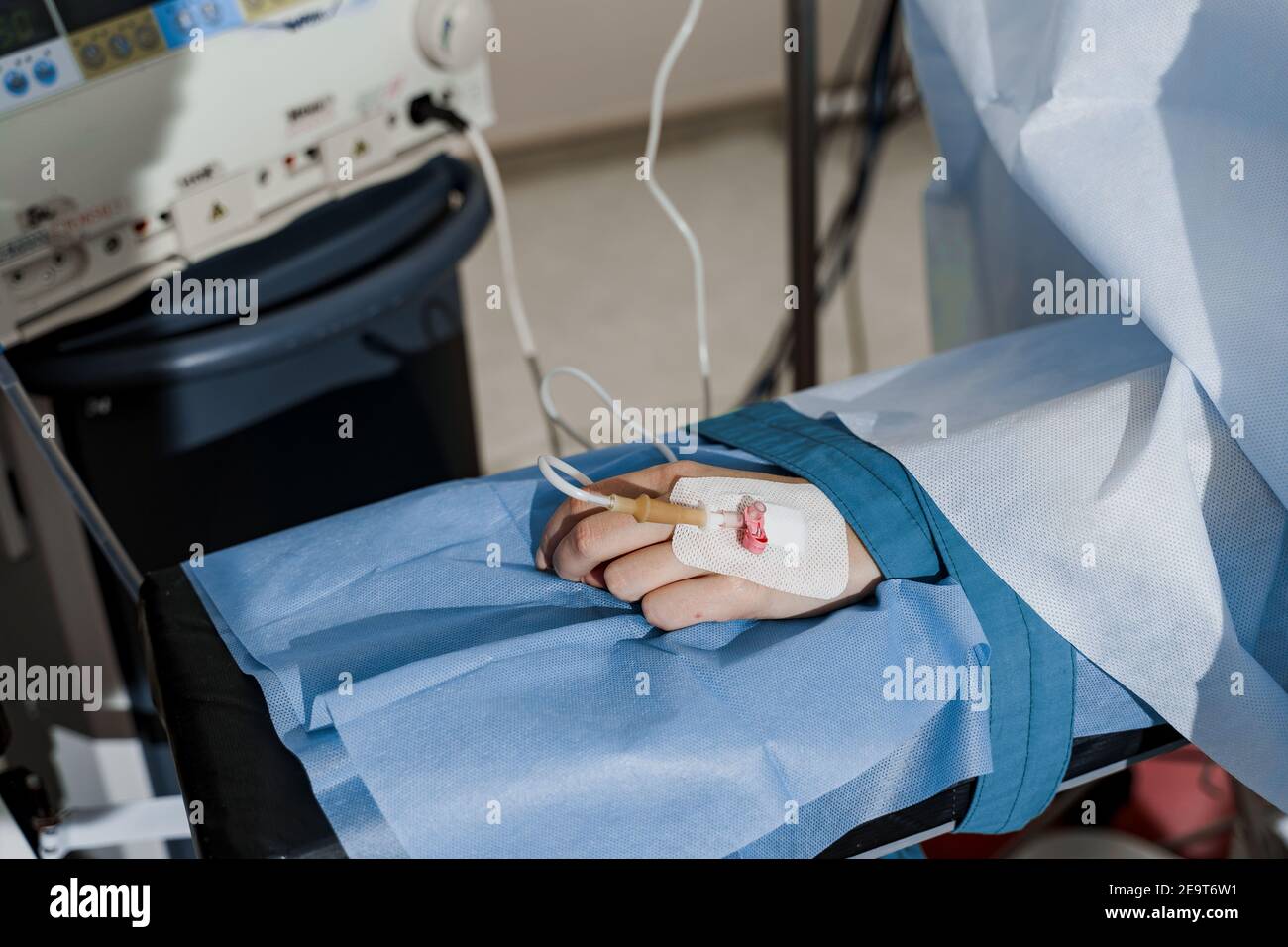 Catheter safely inserted into woman hand on plastic operation ...