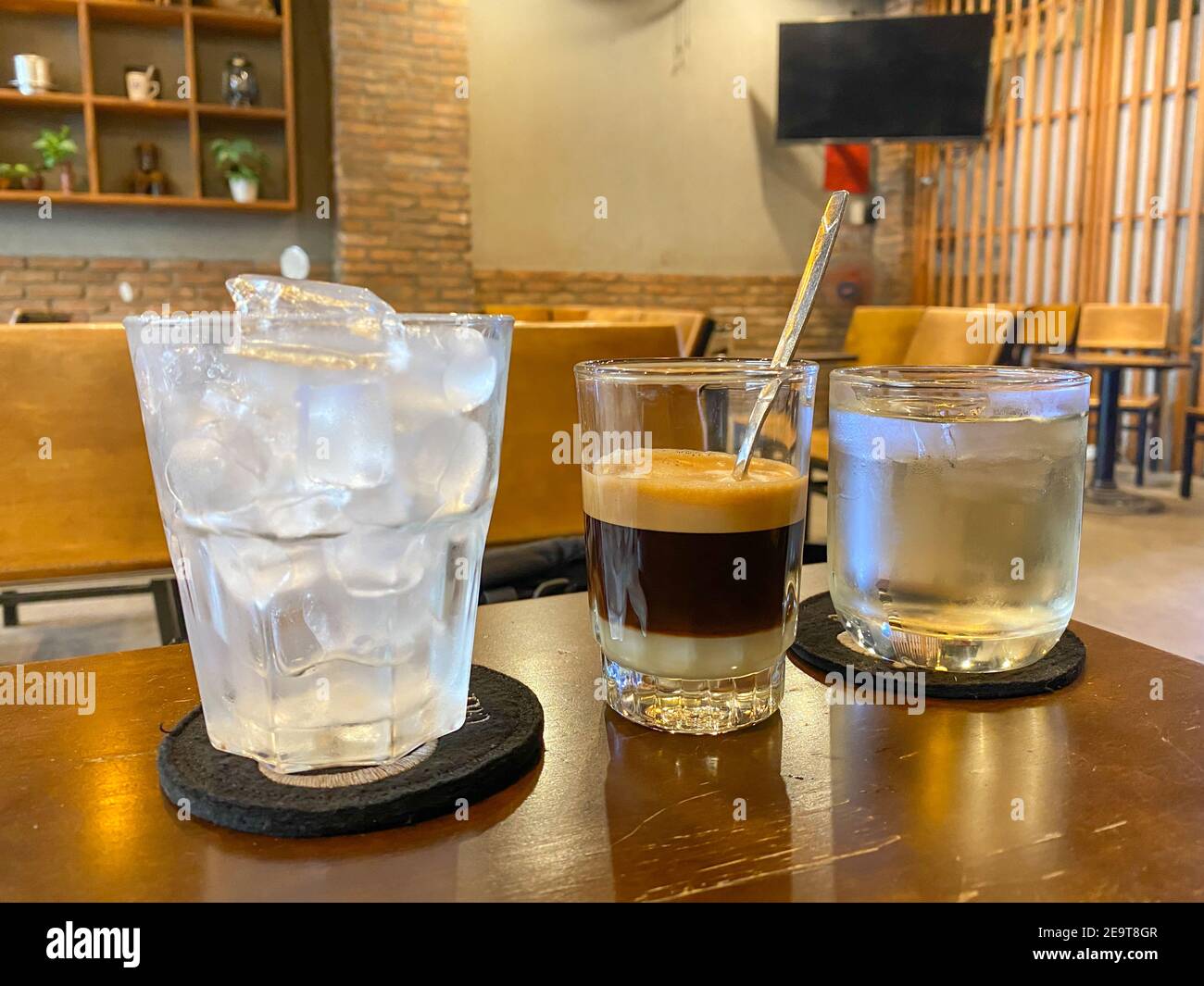Famous traditional Vietnamese fin coffee with condensed milk and ice ...