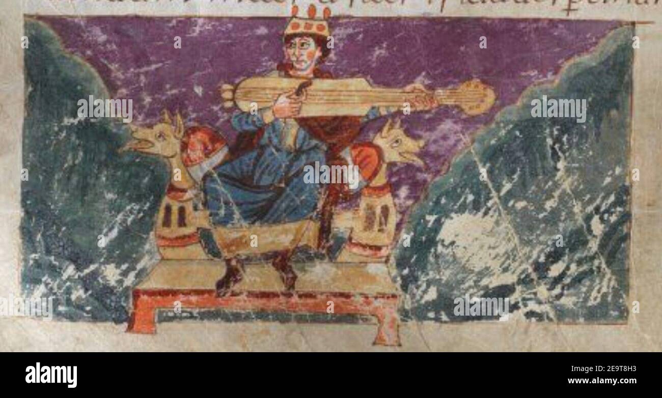 Musician playing a medieval cythara 4 Stock Photo - Alamy