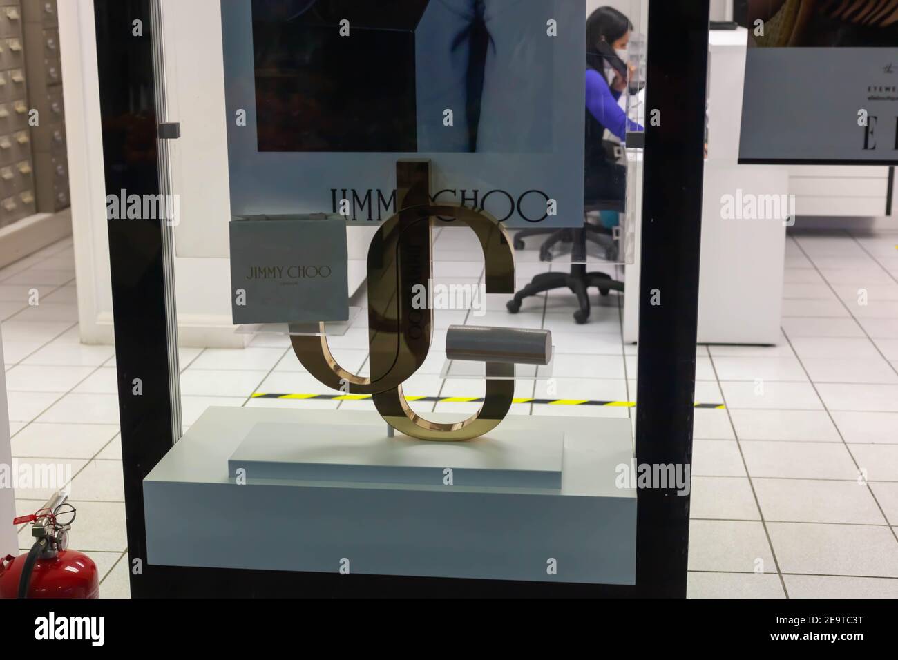 View of Jimmy Choo logo in the window of an opticians store window ...