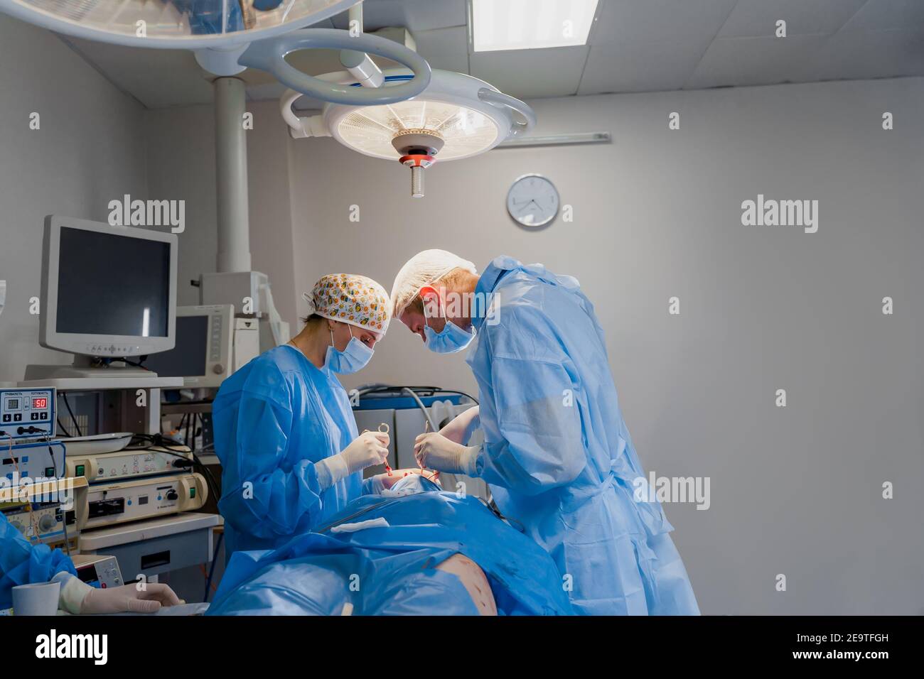 Lipofilling surgery operation. 2 surgeon do plastic surgery named ...
