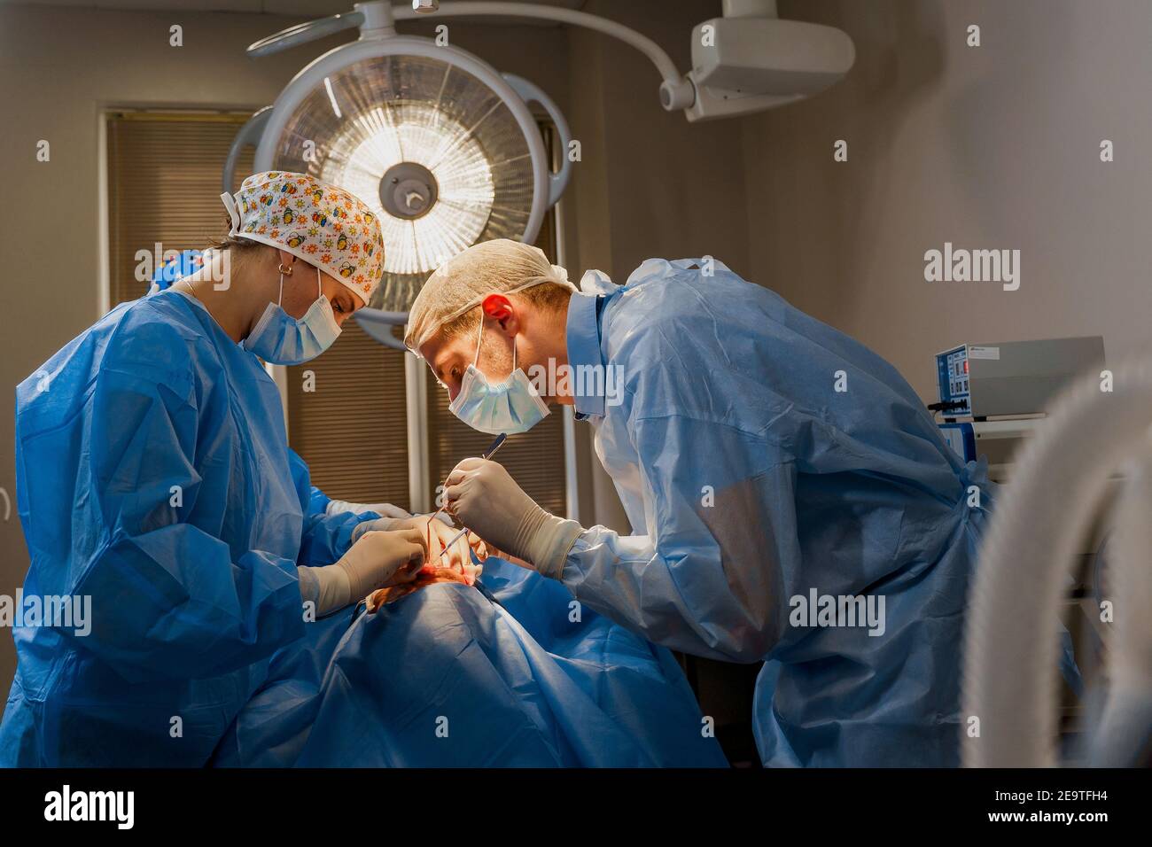 Lipofilling surgery operation. 2 surgeon do plastic surgery named ...