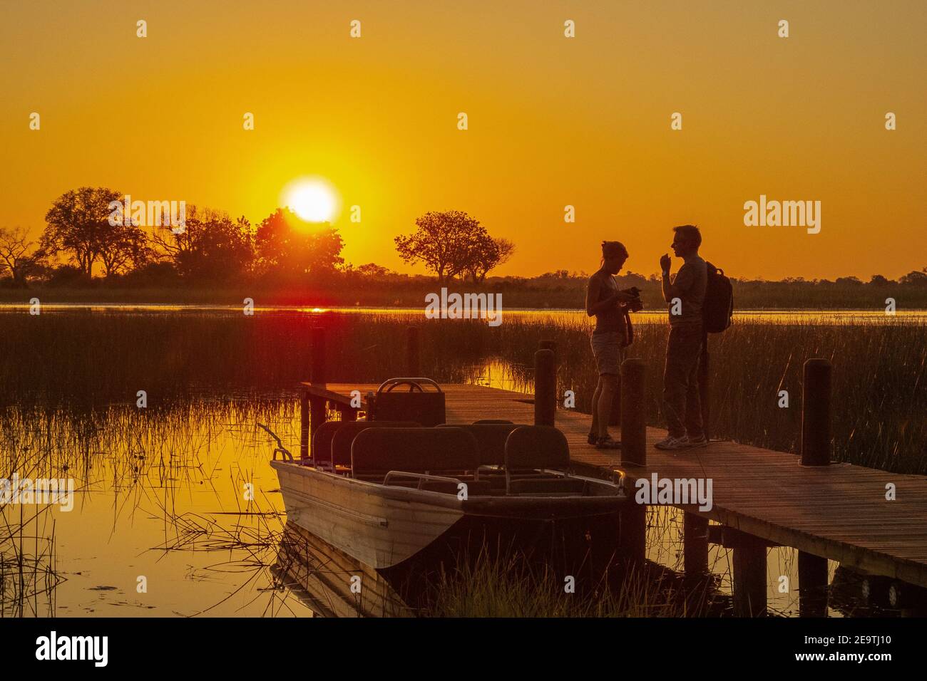 Sunset on one of the lagoons in Okavango Delta of Botswana, Southern ...