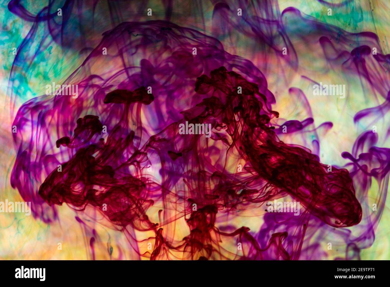 Acrylic colors and ink in water. Abstract background Stock Photo - Alamy