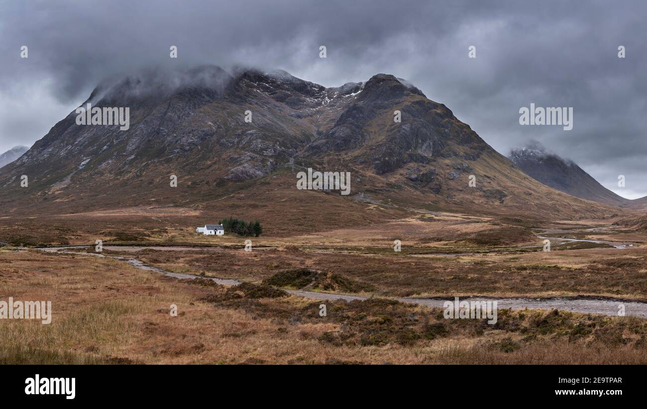 Stunning landscape image view down Glencoe Valley in Scottish Highlands ...