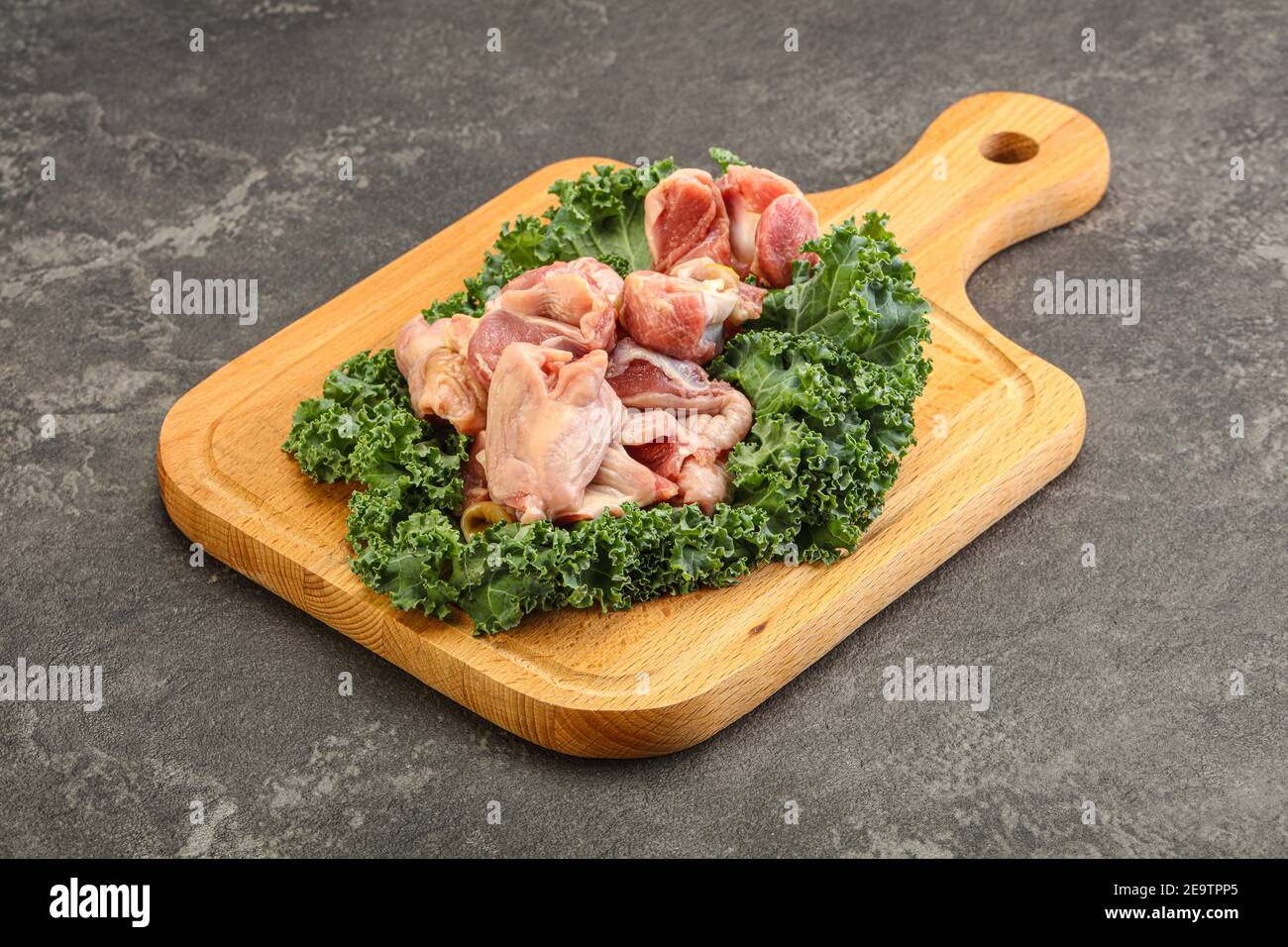 Raw tasty chicken stomach for cooking Stock Photo - Alamy