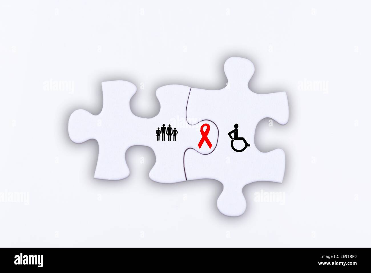 Illustration of puzzle pieces with a group of people, AIDS sign and a ...