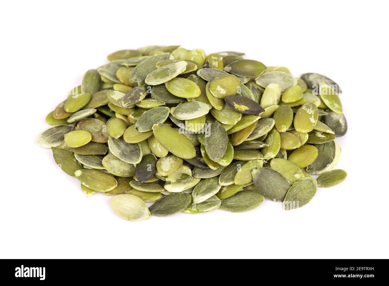 Pumpkin seeds isolated on white background. Green pepita seeds Stock ...