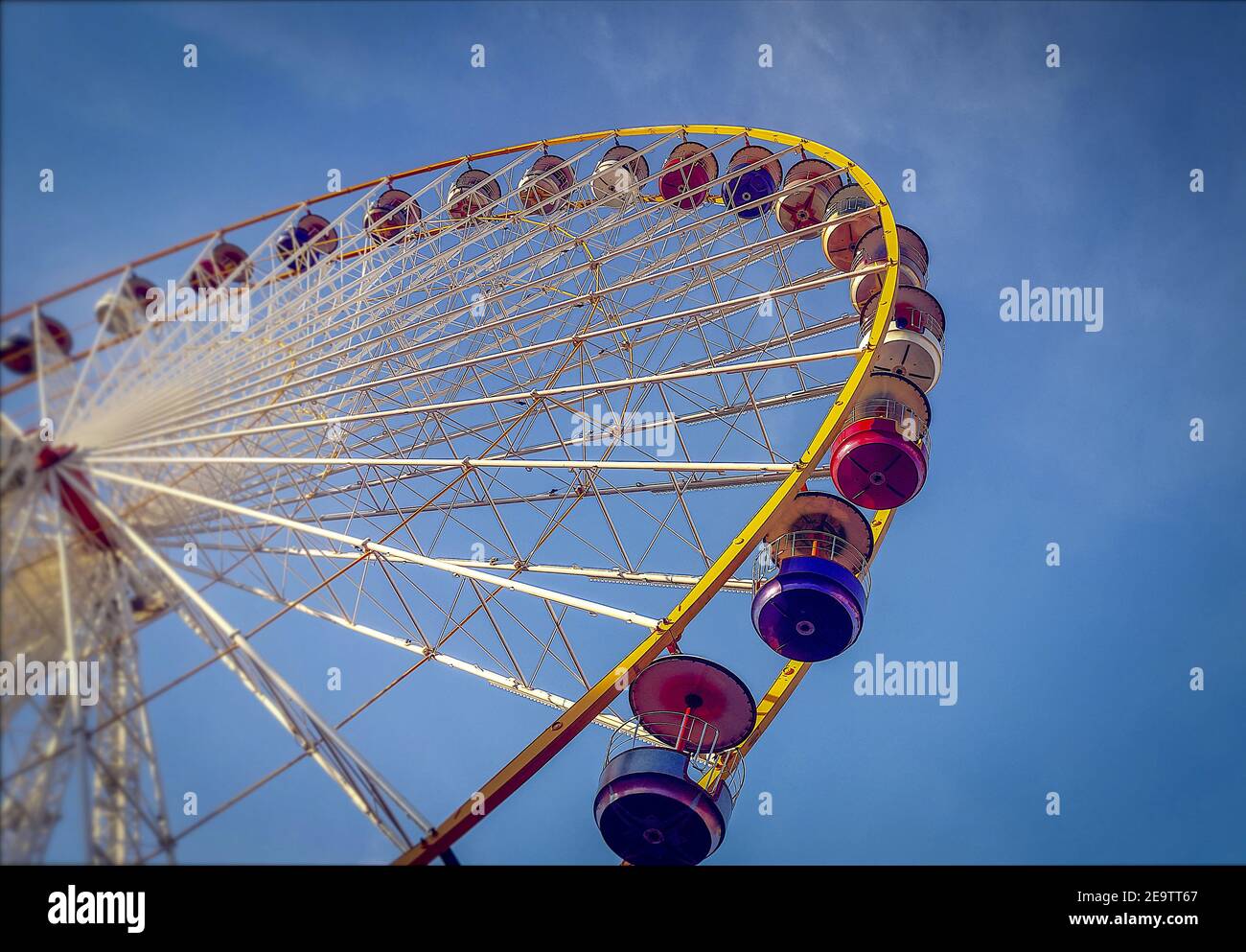 Low angle shot of a Ferris wheel captured during the daytime Stock ...
